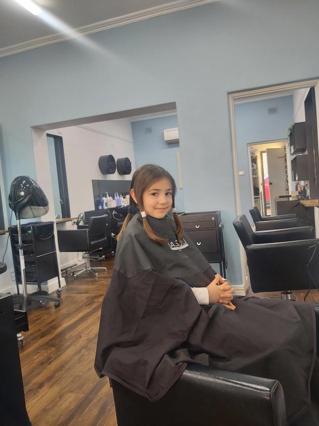 Martina gets hair chopped for Variety’s Hair with a Heart | The Islander