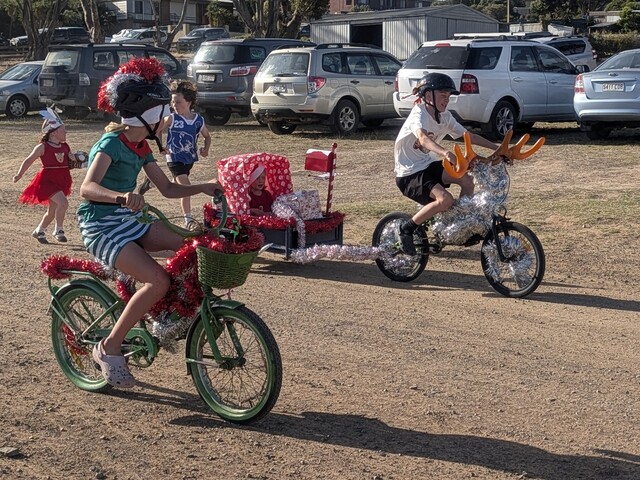 Trucks, bikes, cop cars at the Advance Kingscote Christmas Pageant ...